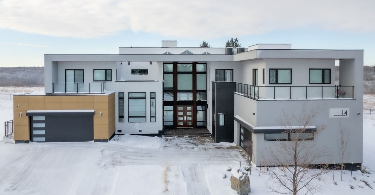 This luxury Alberta home for sale has 15k sqft of space & a roof top deck