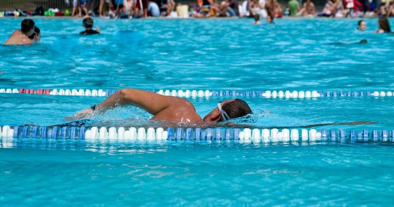 When do the outdoor pools in Vancouver reopen for the season?