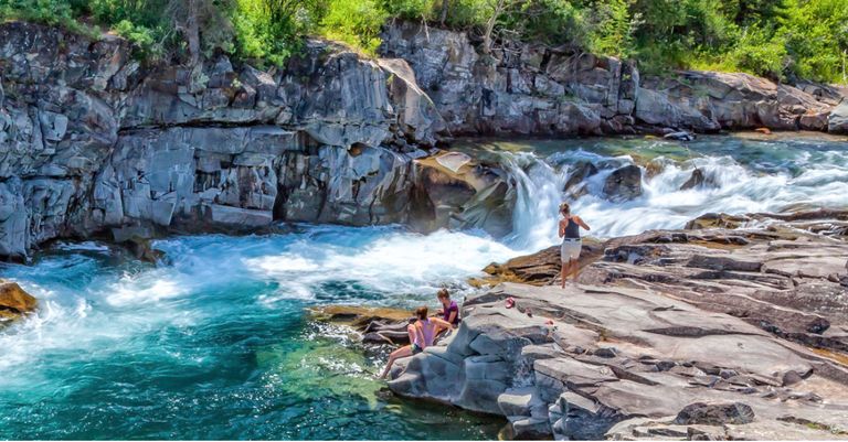 Castle Falls, Alberta has crystal clear river where you can swim