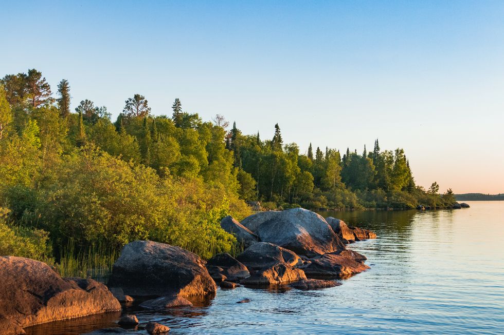 Sandbar Lake Provincial Park has sandy shores & aspen forests