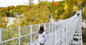 Ranney Gorge Suspension Bridge in Ontario overlooks lush fall foliage